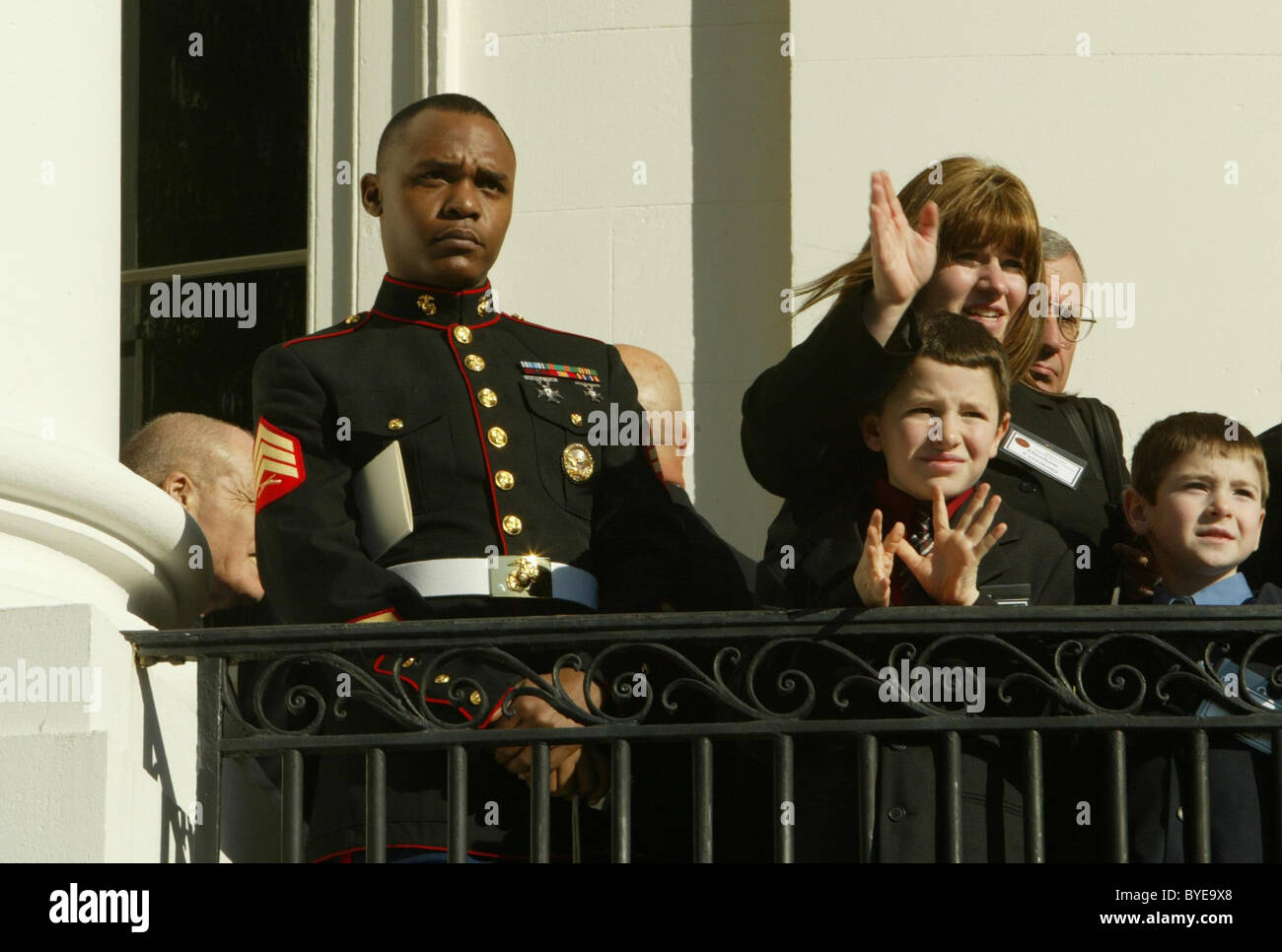 Waving to the President President George W. Bush sheds a tear while ...
