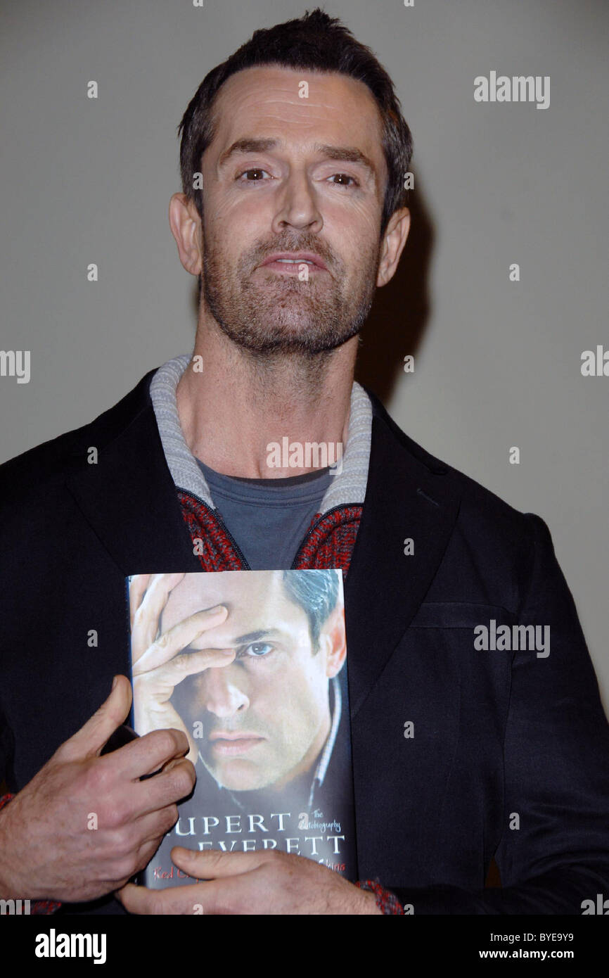 Rupert Everett signs copies of his new autobiography 'Red Carpet and ...