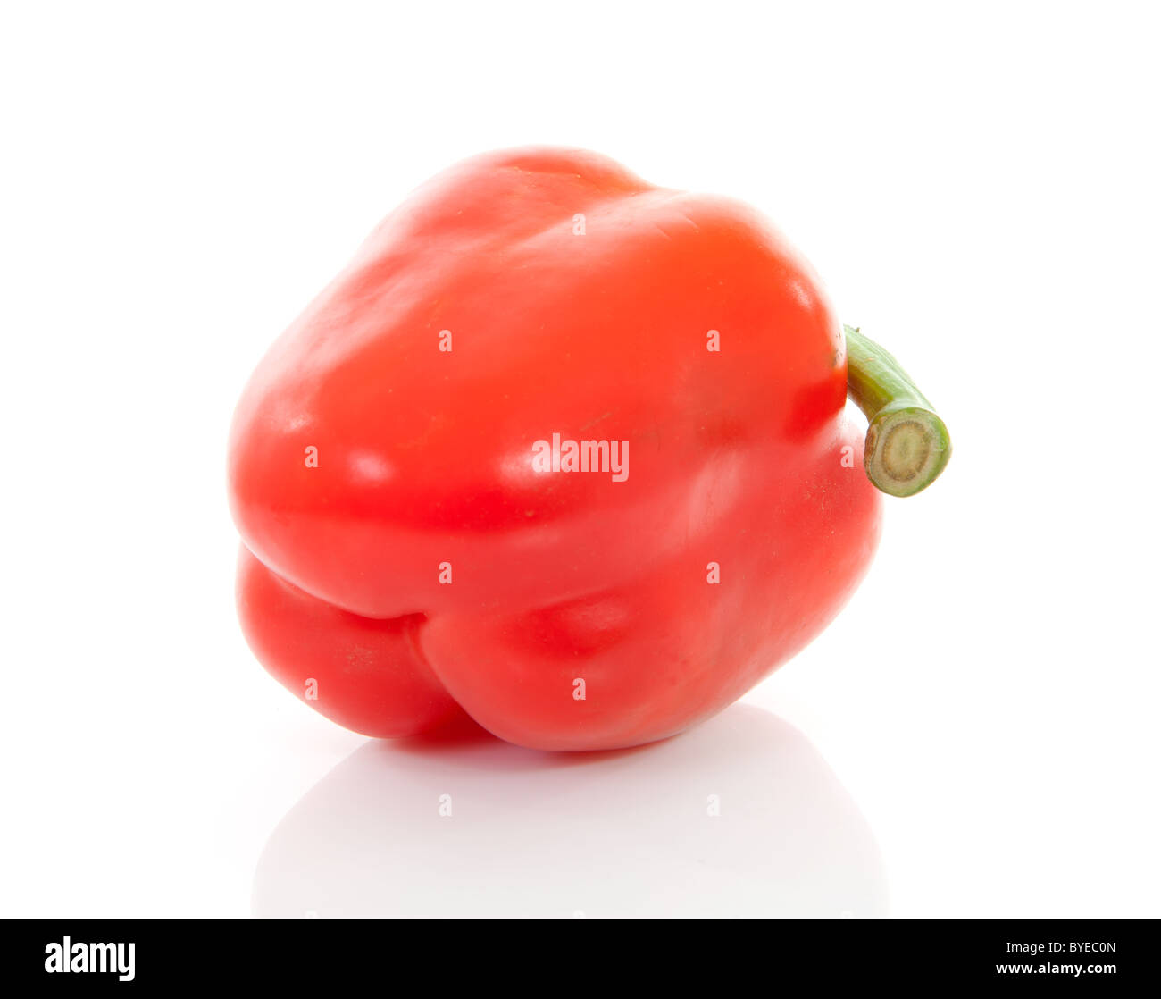 one fresh red paprika over white background Stock Photo - Alamy