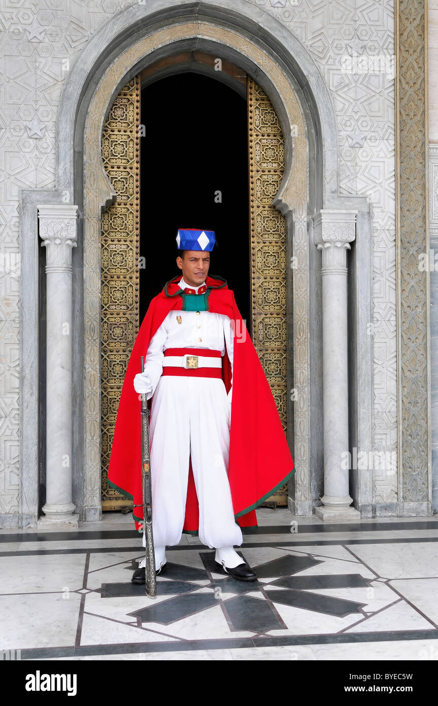 Guard wearing a traditional uniform in front of the entrance to the ...