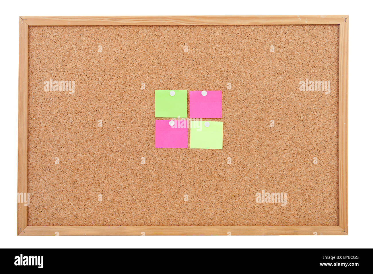 Blank sticky notes pinned on cork memo board in closeup over white ...