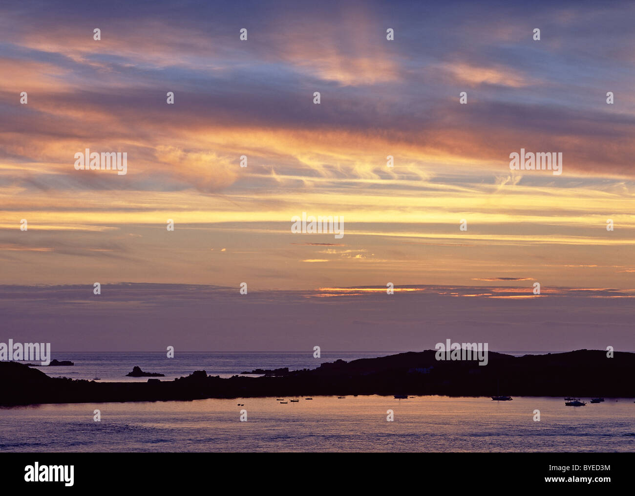 The island of Bryher (Scilly Isles, UK) as seen from Tresco at sunset ...