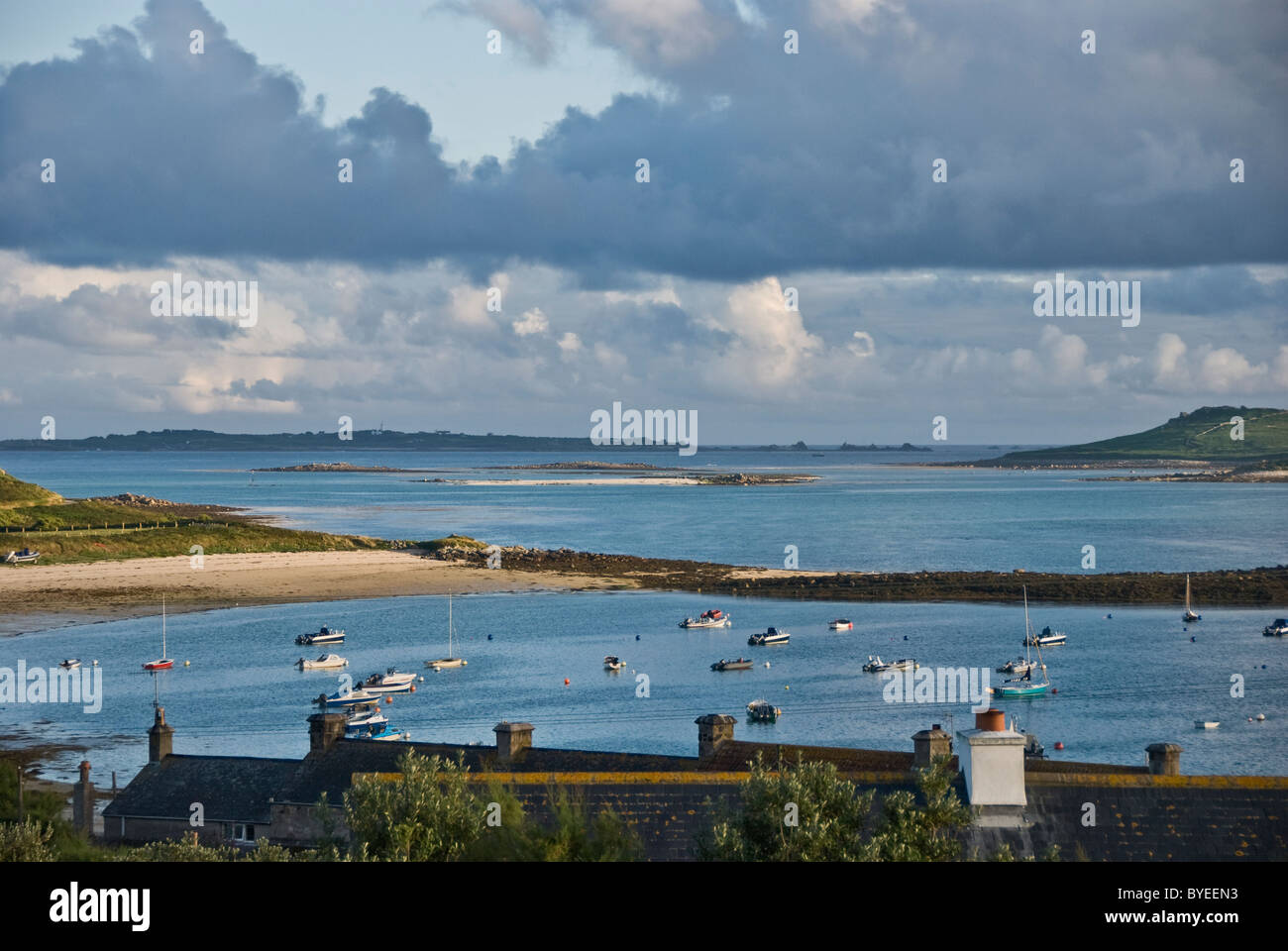 Tresco, the Scilly Isles, UK. View over the roofs and harbour of New ...