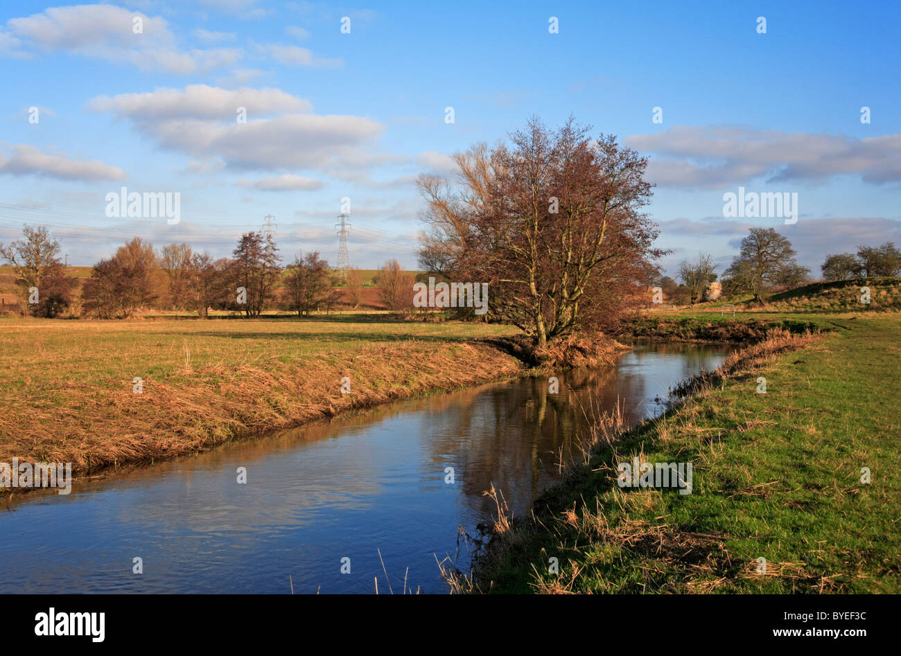 A view of the River Tas meandering through the Norfolk countryside at ...