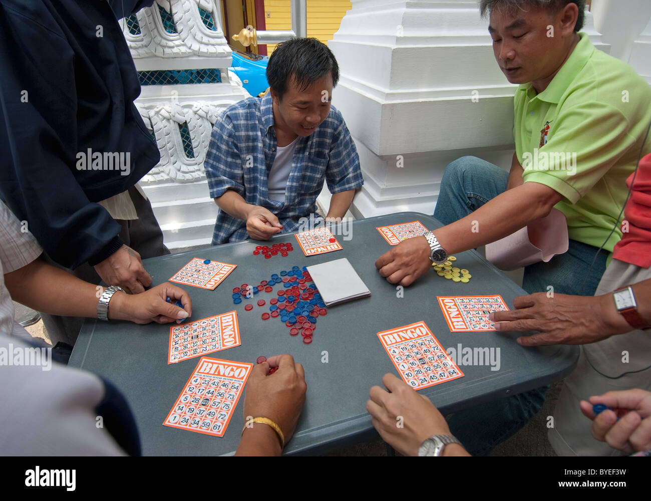 Men playing bingo in Bangkok Stock Photo - Alamy
