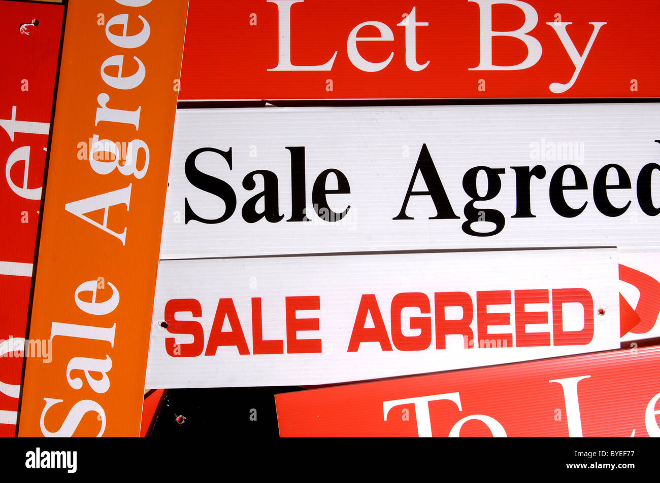a selection of estate agents signs for sale and sale agreed Stock Photo ...