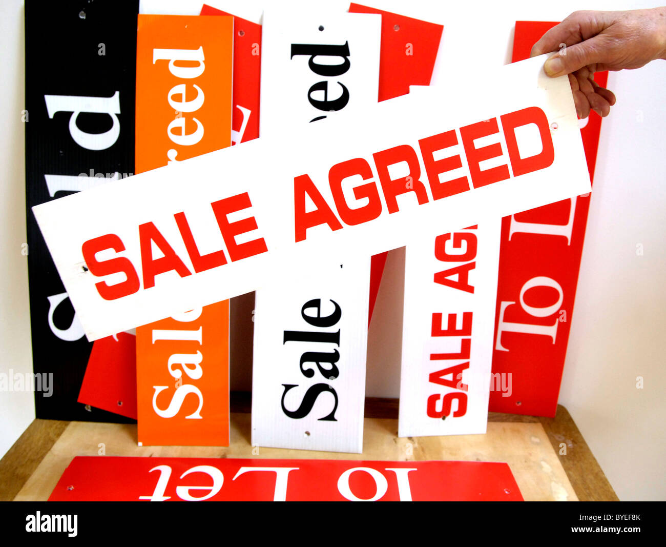 a selection of estate agents signs for sale and sale agreed Stock Photo ...