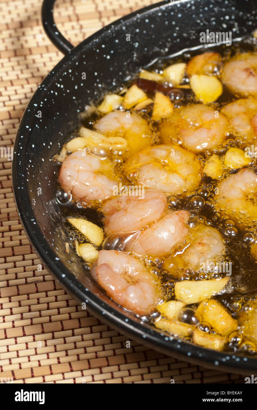 Hot sizzling prawns, a delicious Spanish tapa Stock Photo - Alamy
