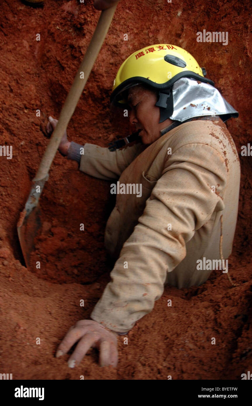 EARLY BURIAL VICTIM SAVED Rescuers battled for hours after an ...