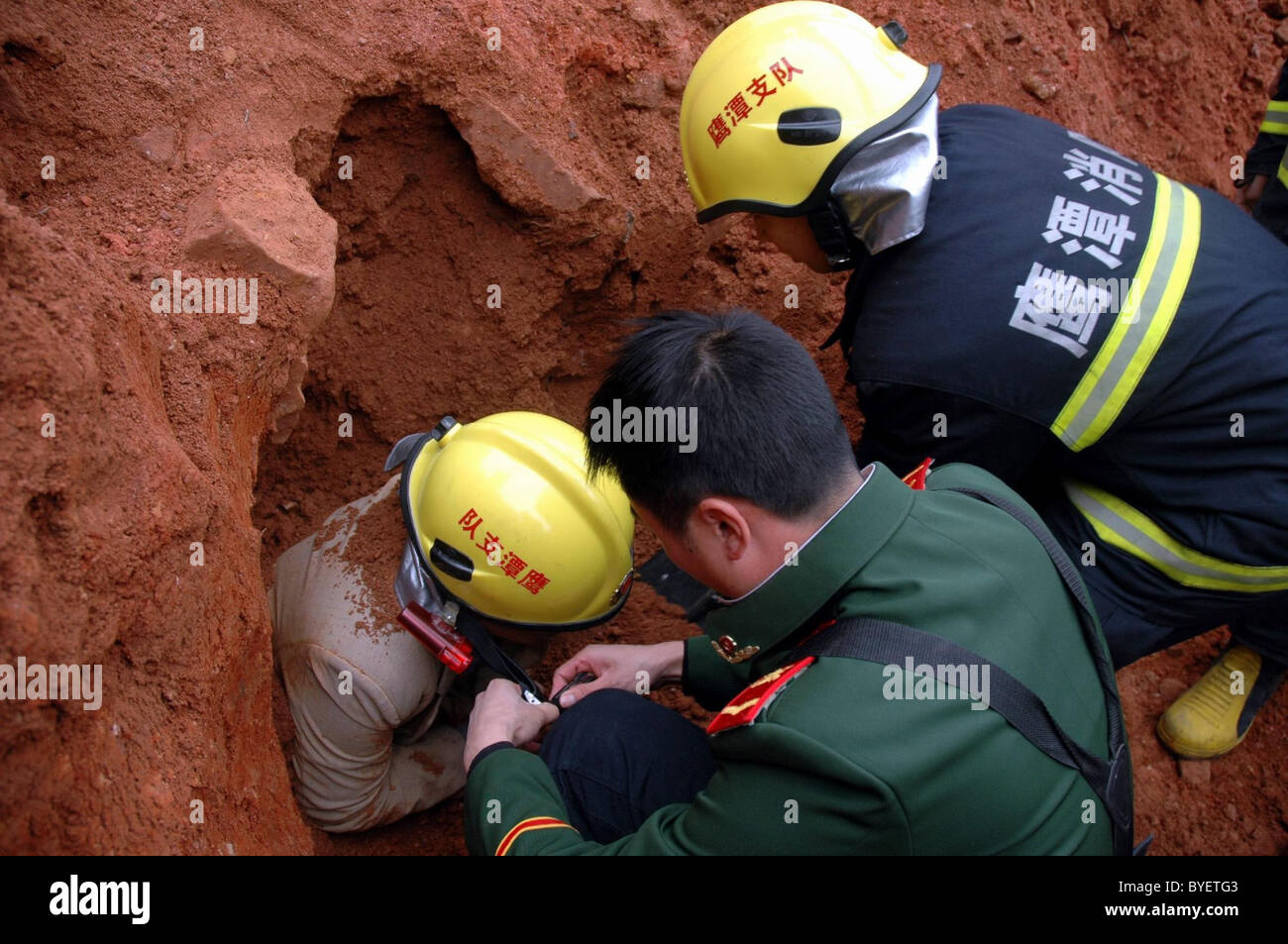 EARLY BURIAL VICTIM SAVED Rescuers battled for hours after an ...