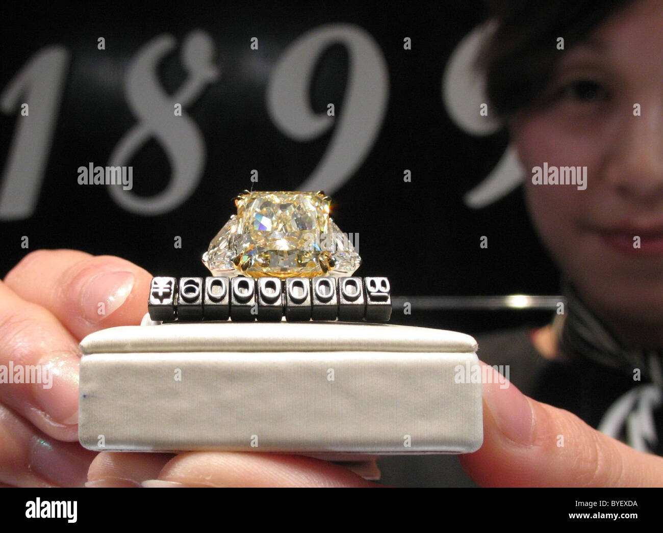 DAZZLING SIX MILLION DIAMOND A saleswoman in a Chinese jewellery store ...