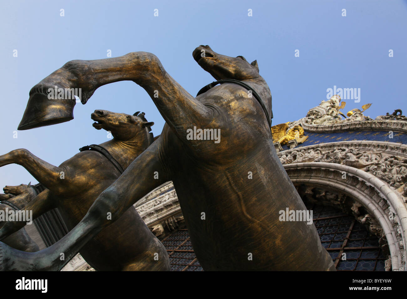 View of the Triumphal Quadriga ancient bronze horses set into facade of St Mark's Basilica in ...