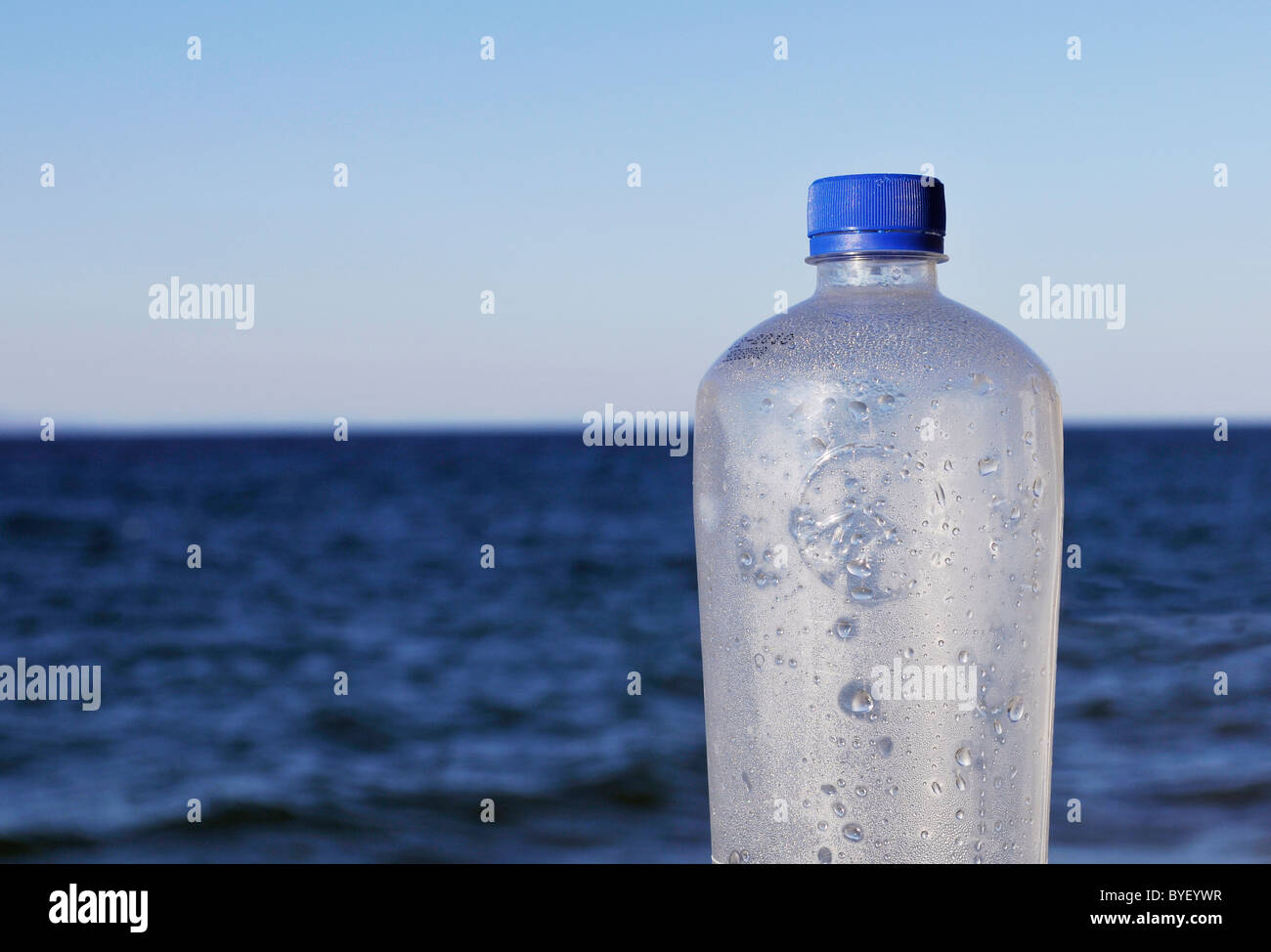 empty plastic water bottle in front of the sea Stock Photo - Alamy