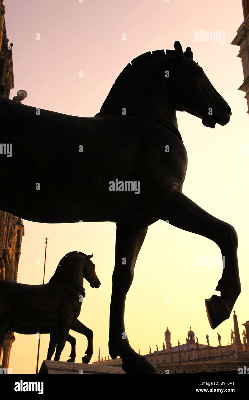 The Triumphal Quadriga ancient bronze horses set into facade of St Mark's Basilica in Venice ...