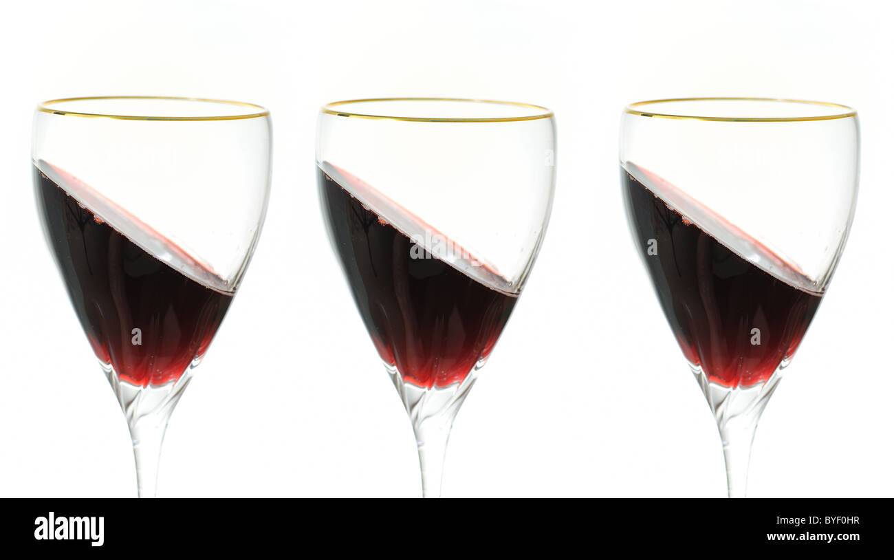 Three wine glasses on a slant Stock Photo - Alamy