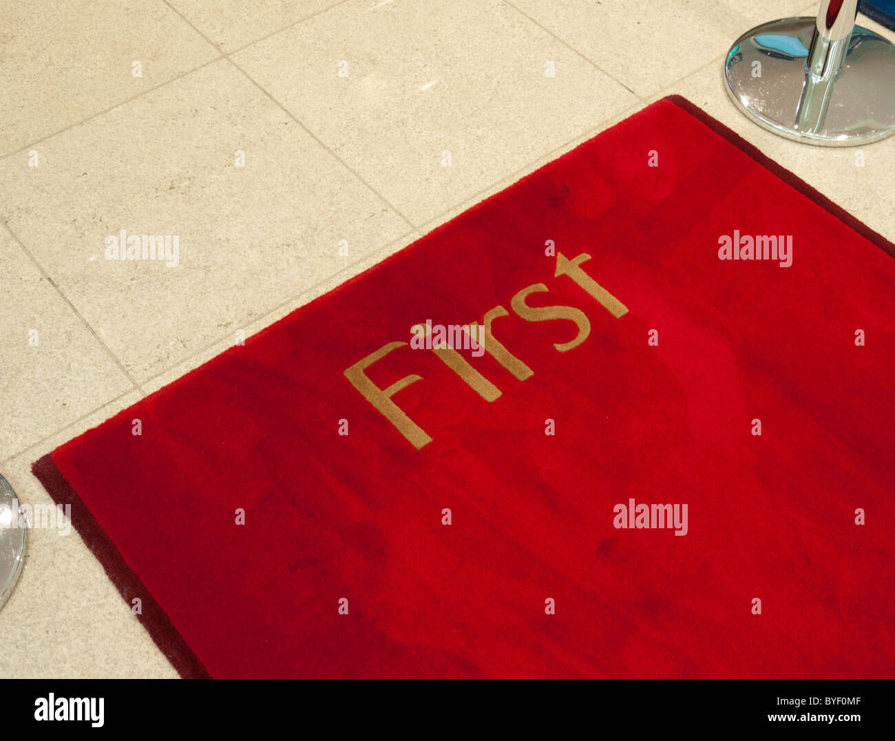 First class carpet at check-in Stock Photo - Alamy