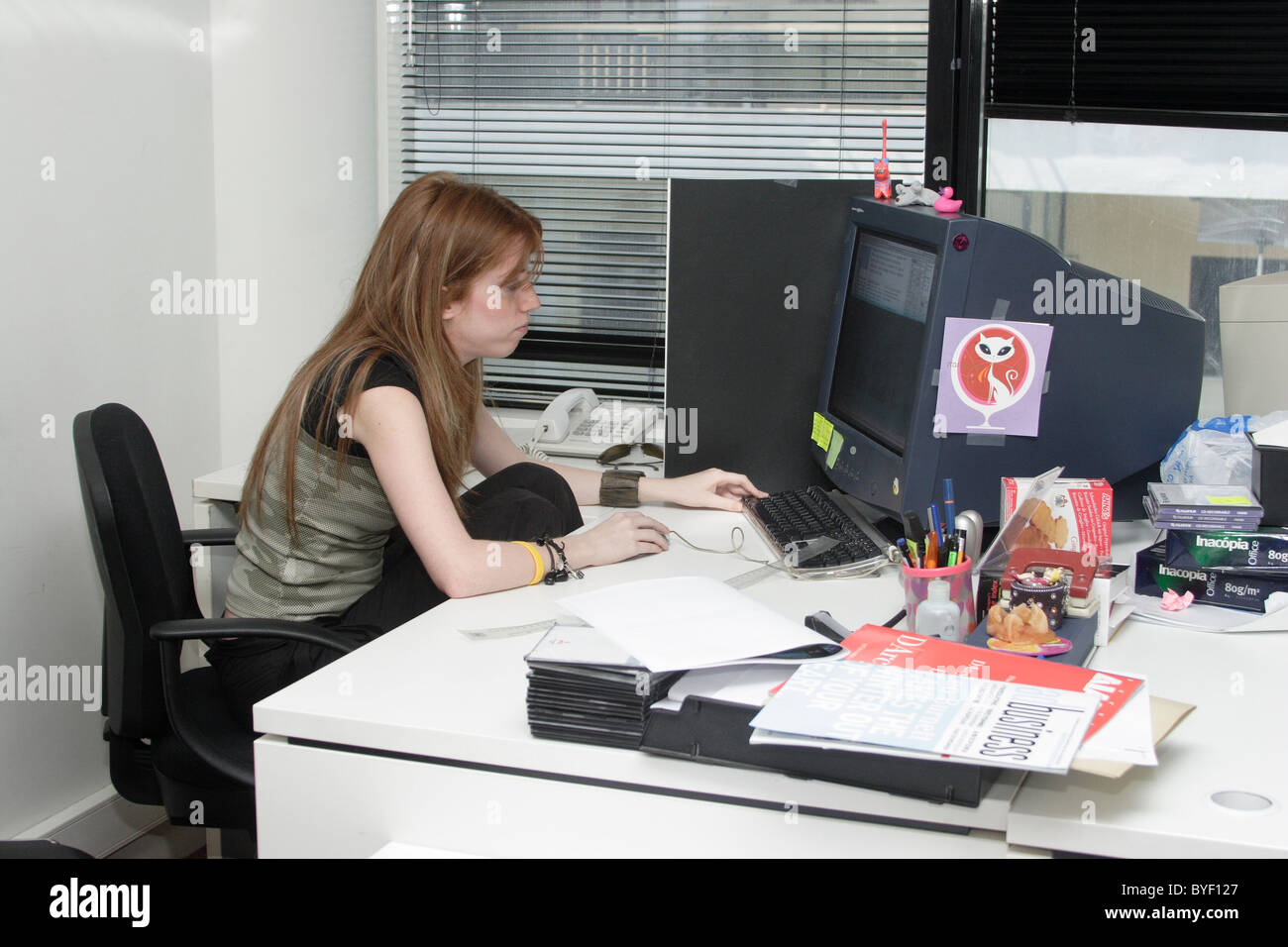 Girls work with computer Stock Photo - Alamy