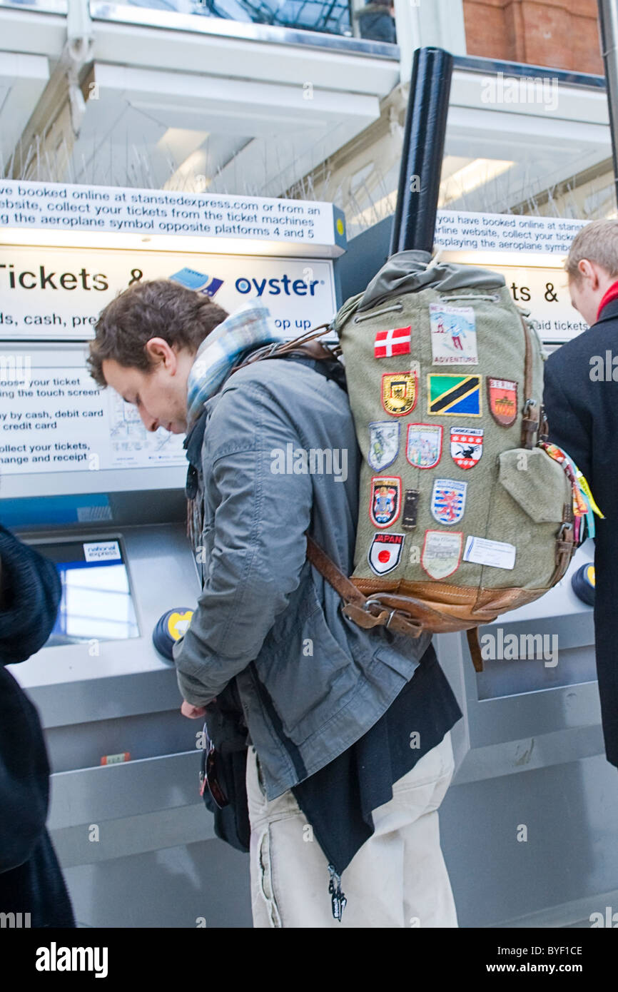 London , Liverpool Street Station , male or man or boy passenger with ...