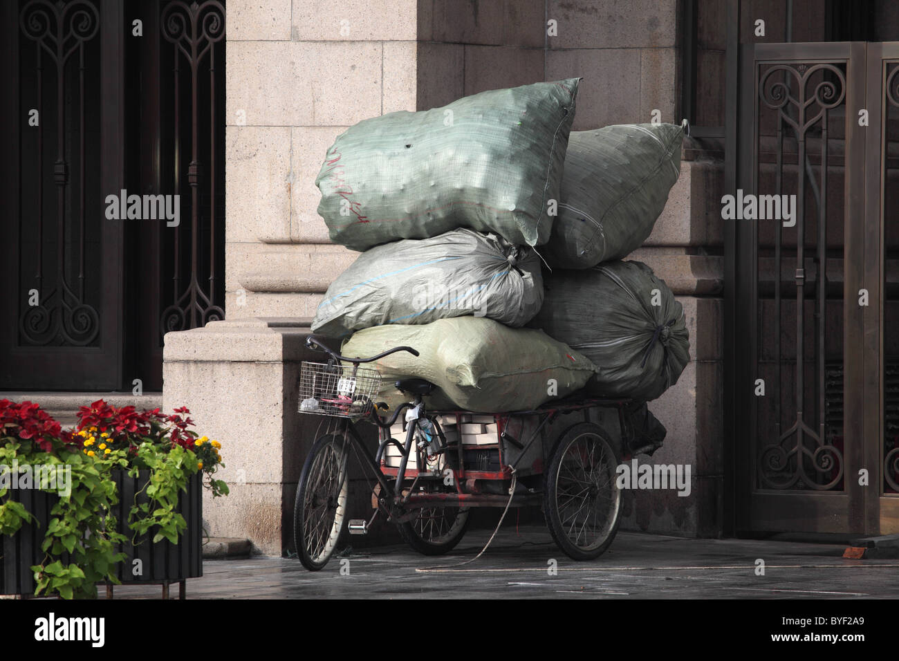 Bike loaded with empty plastic bottles. Shanghai China Stock Photo - Alamy