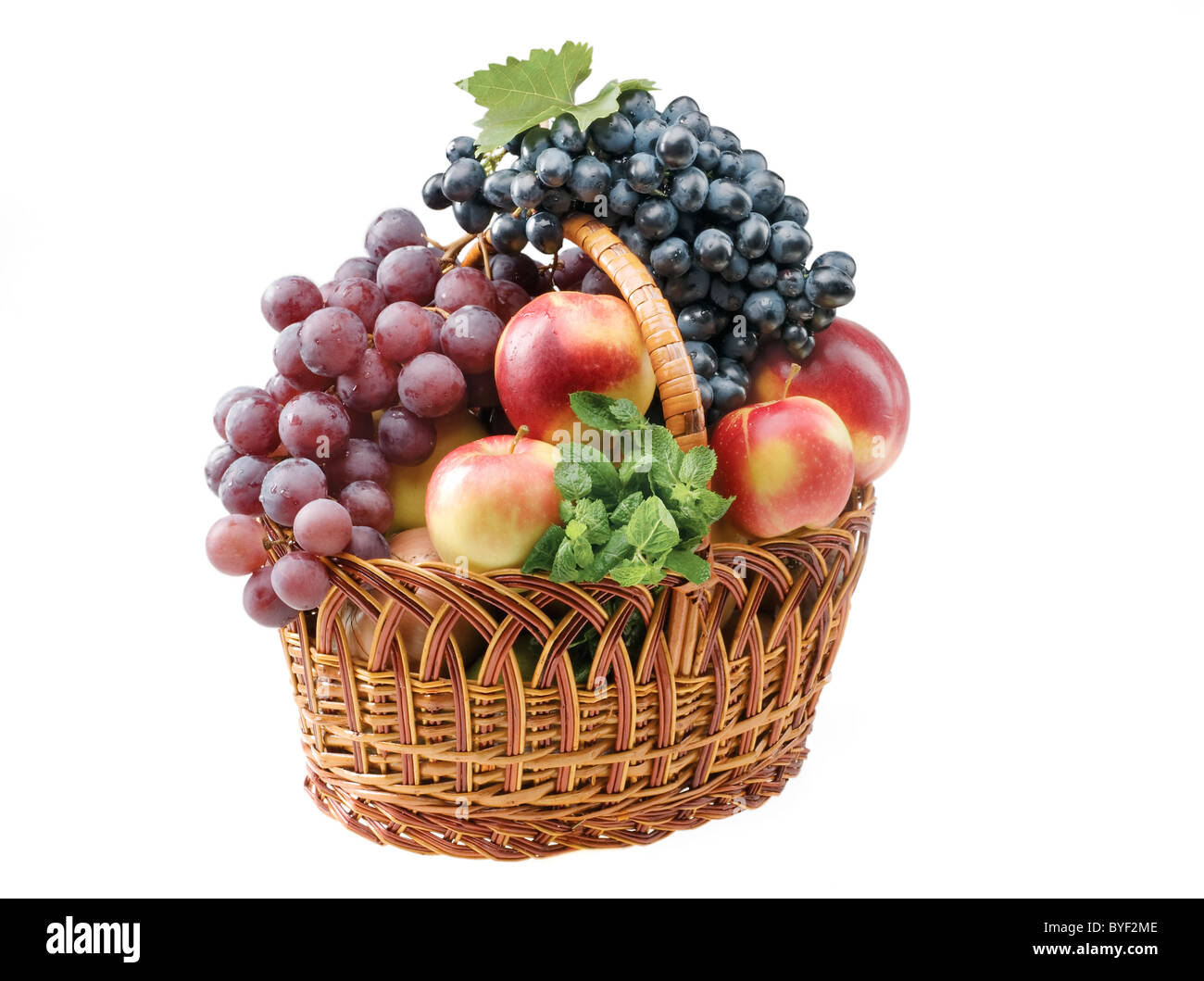Group of fruit food objects in a basket Stock Photo - Alamy