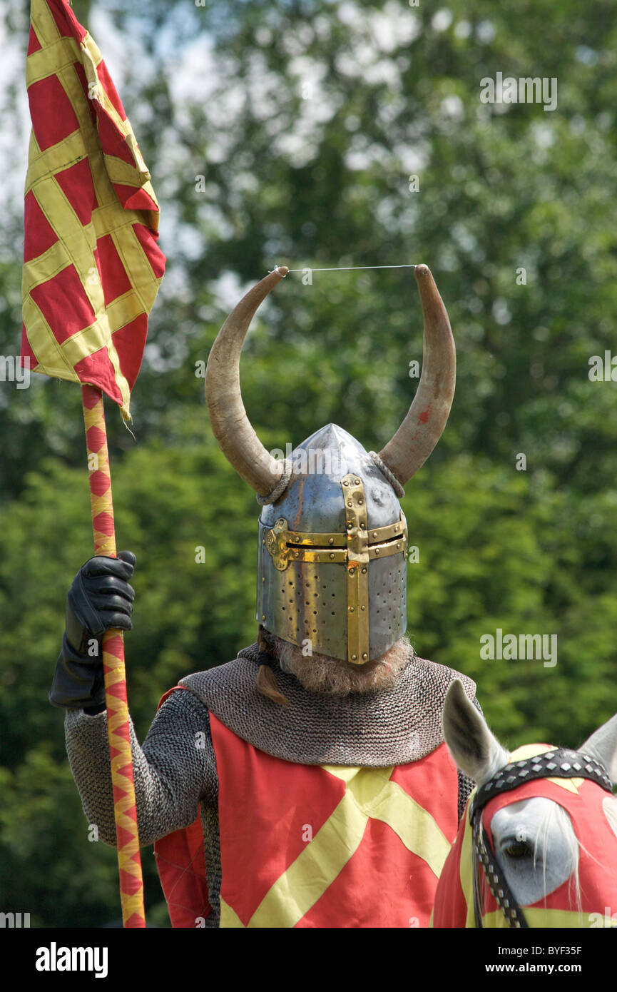 Jousting knight on horseback at Leeds Castle wearing chain-mail, the ...