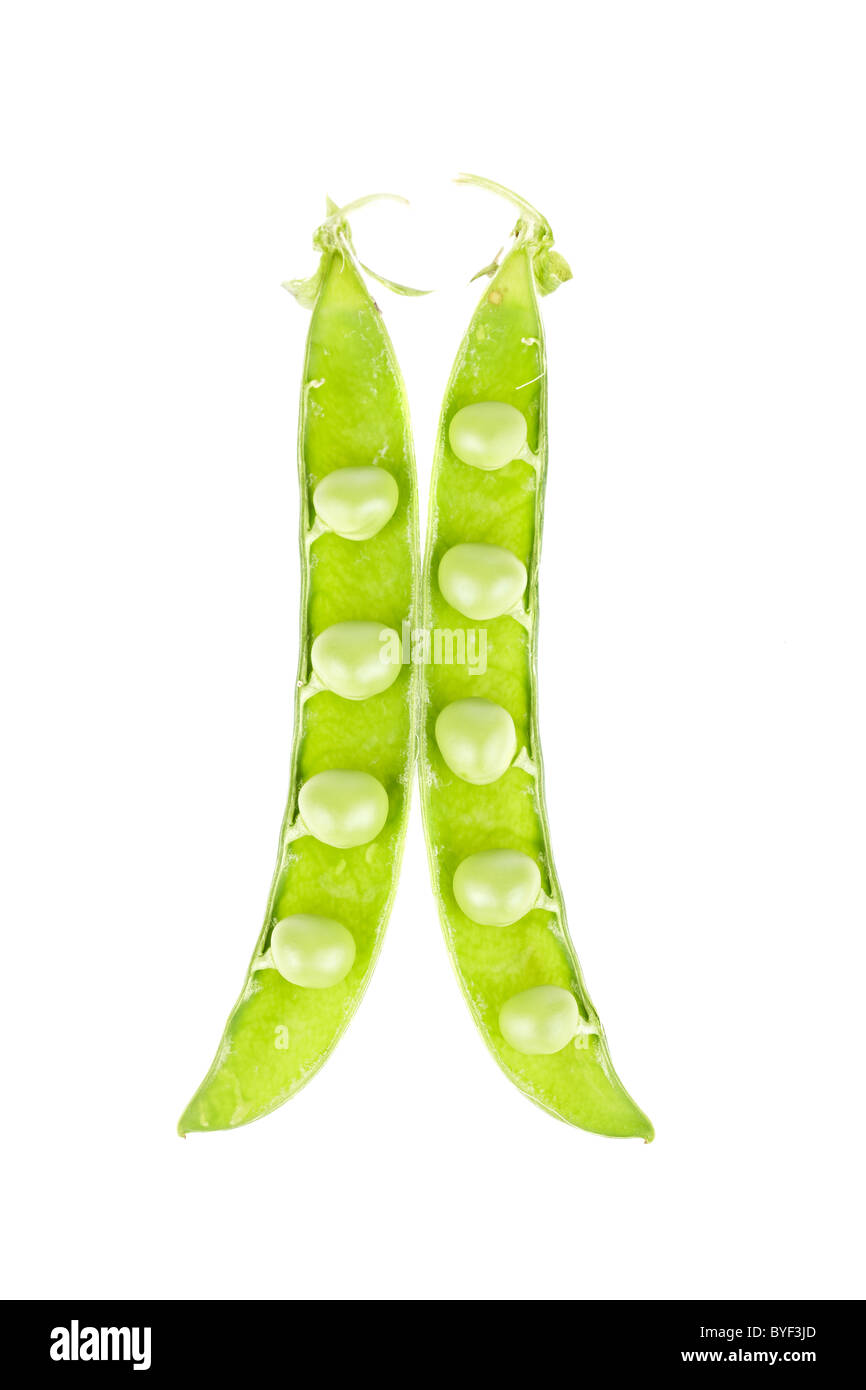 Fresh sweet peas with pod isolated on a white background. Shallow depth ...
