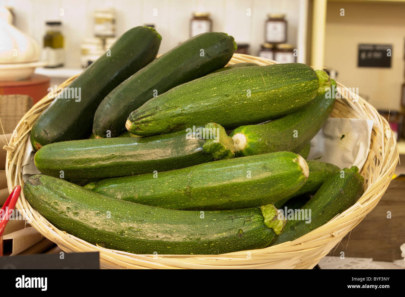 Basket Of Courgettes Stock Photo - Alamy