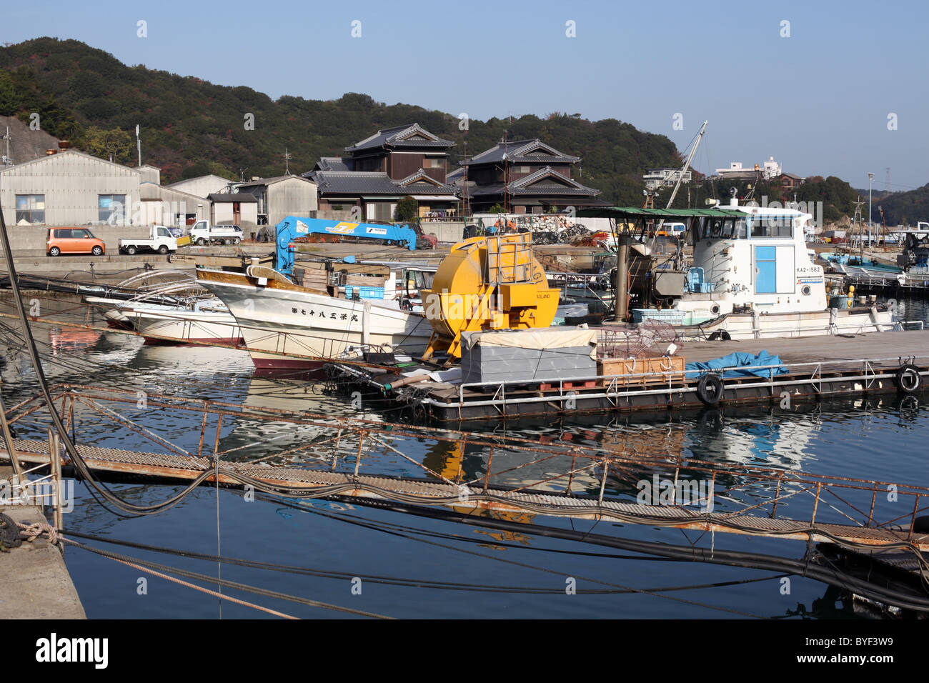 Boats docked in Honmura Port, Nao Shima island, Shikoku, Japan Stock ...