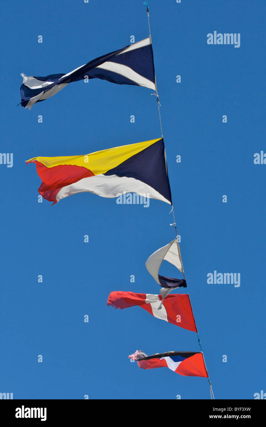 Flags and pennants flying at Beer in Devon Stock Photo - Alamy