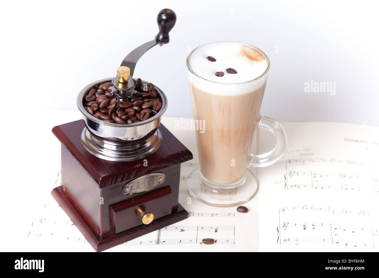 coffee cup with coffee grinder on sheet music Stock Photo - Alamy