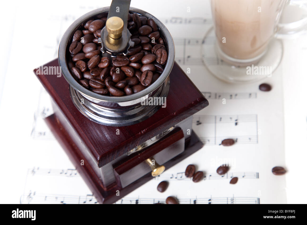 coffee cup with coffee grinder on sheet music Stock Photo - Alamy
