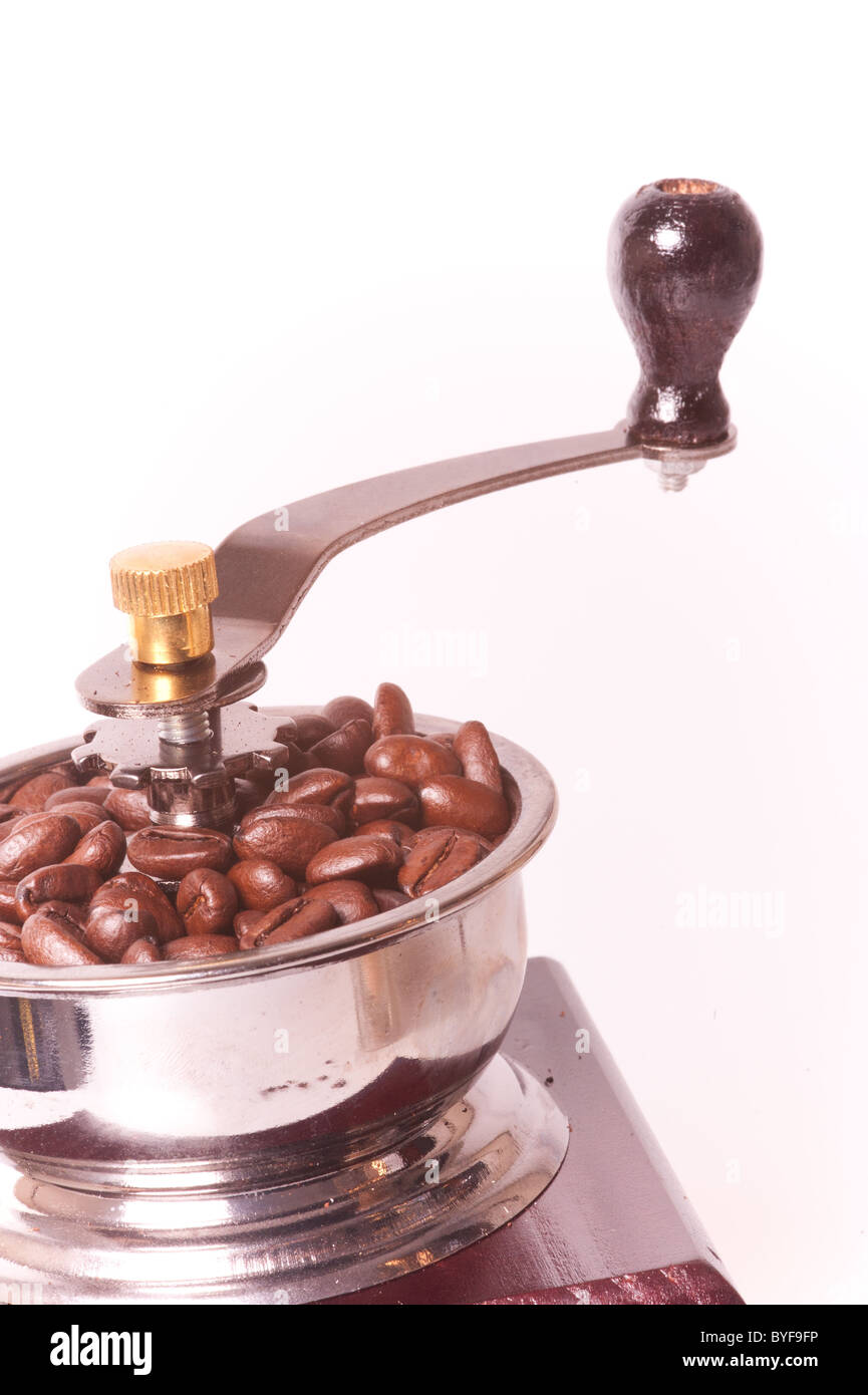 coffee maker with coffee beans in white background Stock Photo - Alamy