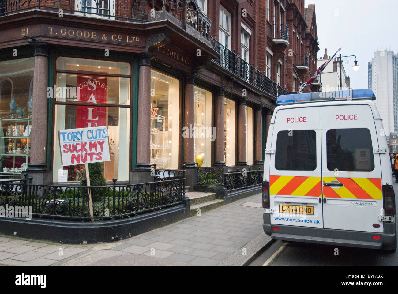 "Tory Cuts Suck my Nuts" protest banner outside Thomas Goode fine china ...