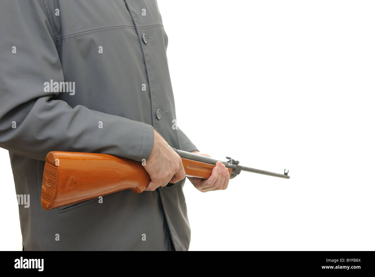Man pointing a gun isolated on white background Stock Photo - Alamy