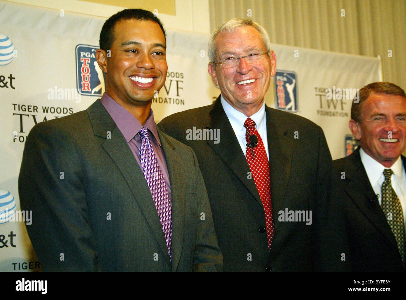 Tiger Woods with AT&T chairman and CEO Edward Whitacre Jr. and PGA ...