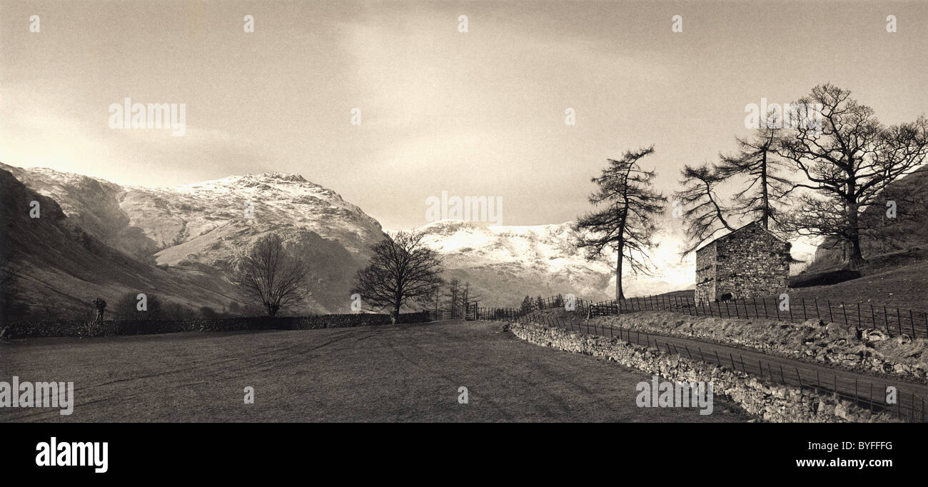 Stone farm buildings alongside a single track road in the Great ...