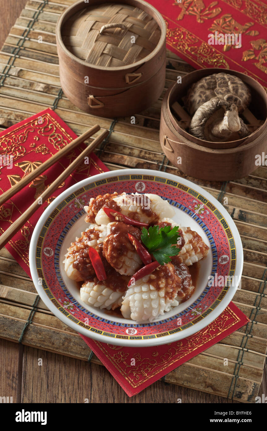 Chilli squid Chinese food Stock Photo - Alamy