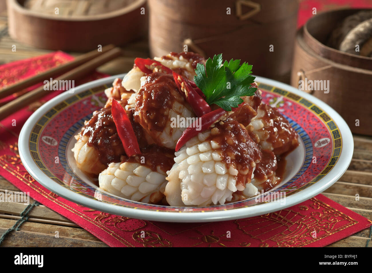 Chilli squid Chinese food Stock Photo - Alamy