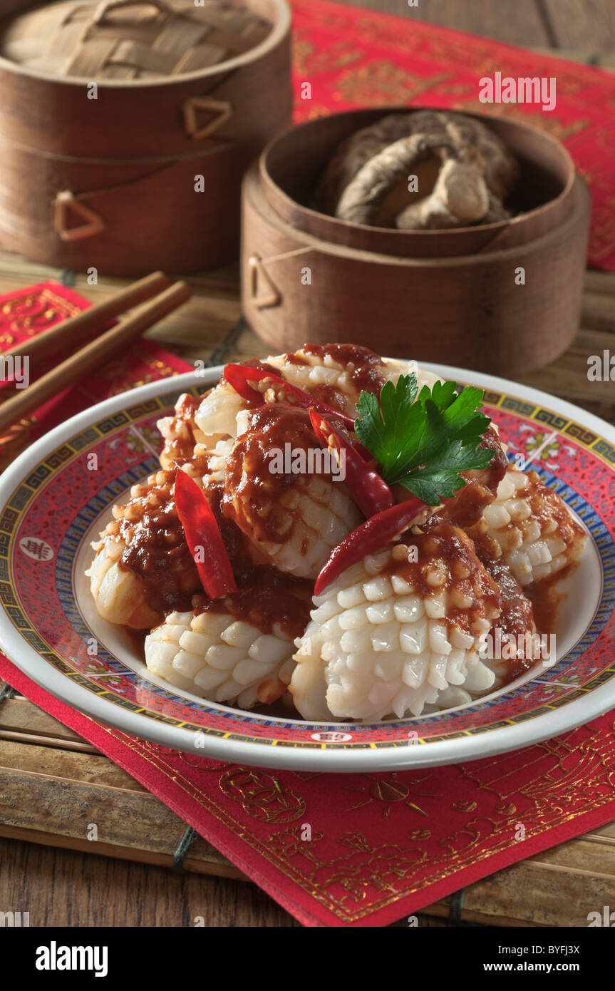 Chilli squid Chinese food Stock Photo - Alamy