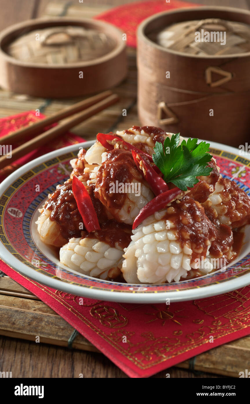 Chilli squid Chinese food Stock Photo - Alamy