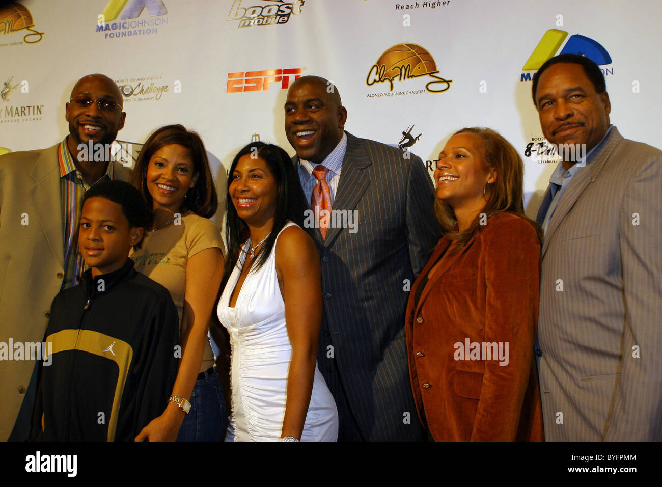 Alonzo Mourning, Magic Johnson, wife Cookie Johnson and Dave Winfield ...