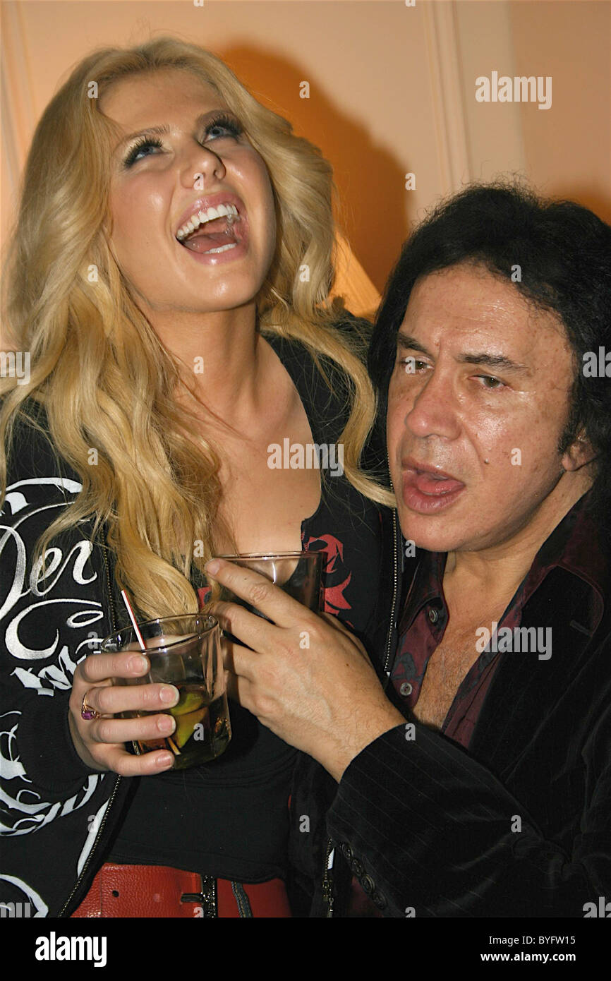 Gene Simmons and Dussault model Gene Simmons celebrates the launch of ...