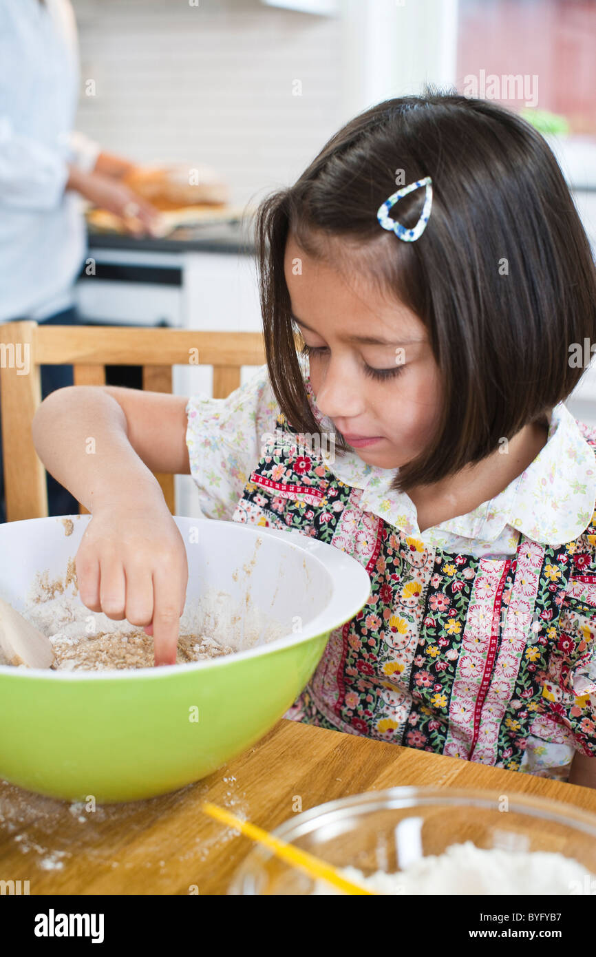 Girl baking in kitchen Stock Photo - Alamy