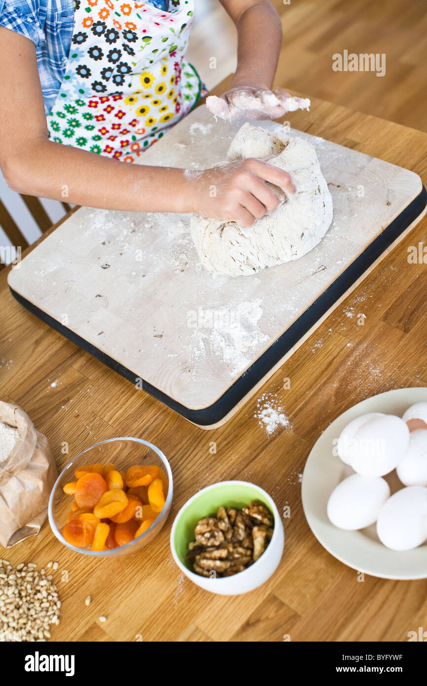 Girl baking in kitchen Stock Photo - Alamy
