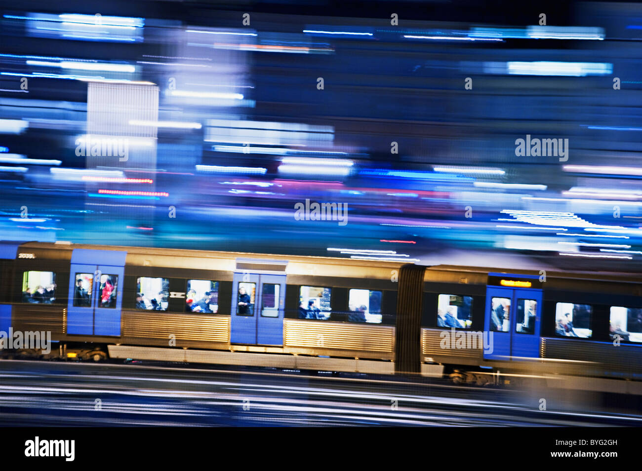 Subway train at night Stock Photo - Alamy