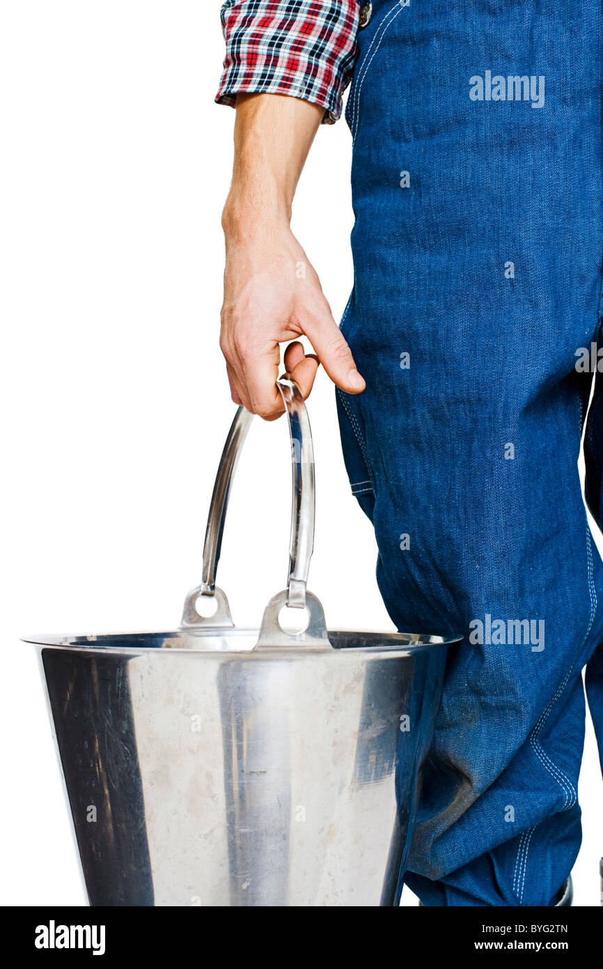 Midsection of farmer holding bucket Stock Photo - Alamy
