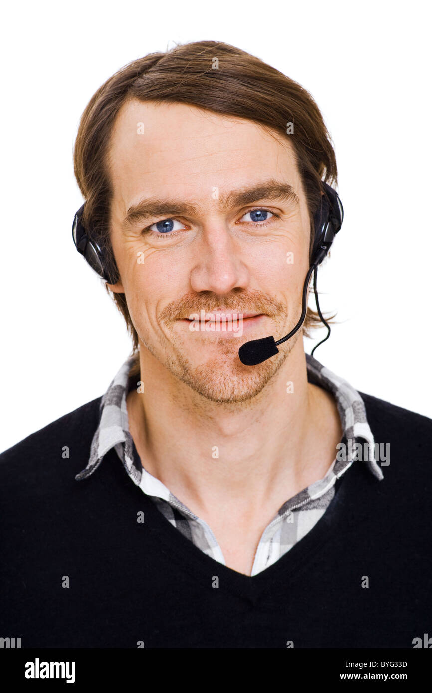 Studio shot of man wearing headset Stock Photo - Alamy