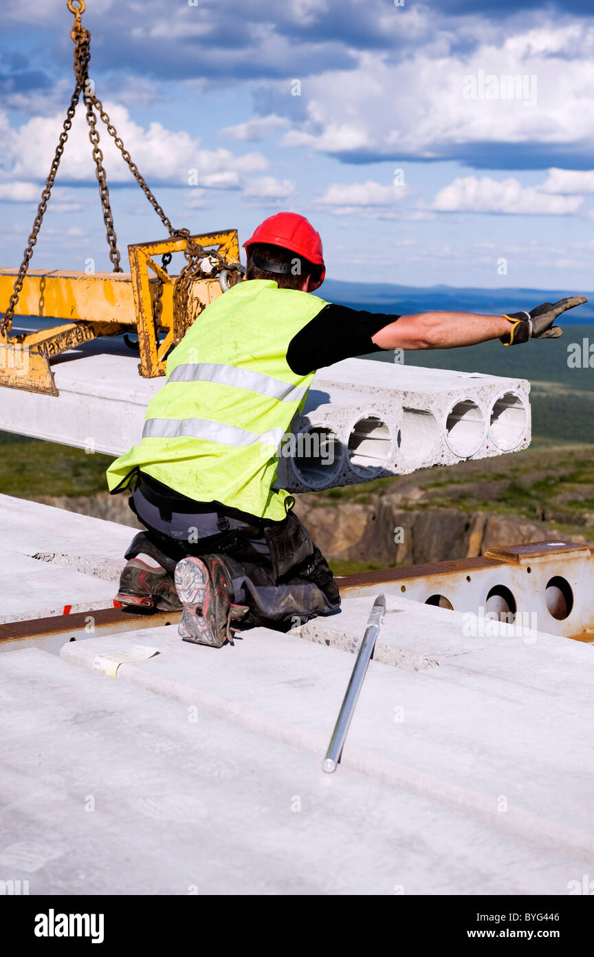 Worker at construction site Stock Photo - Alamy