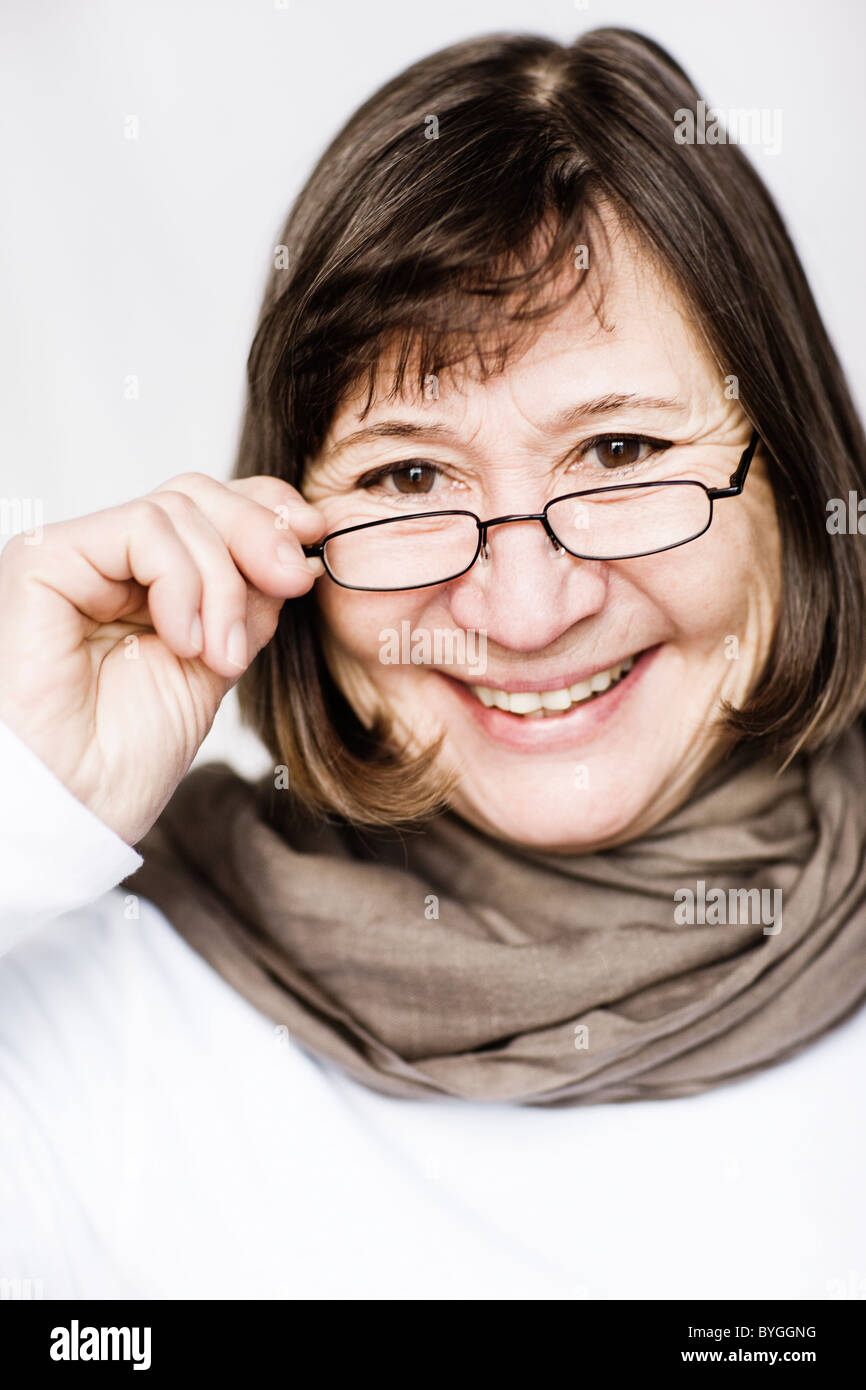Smiling woman wearing spectacles Stock Photo - Alamy