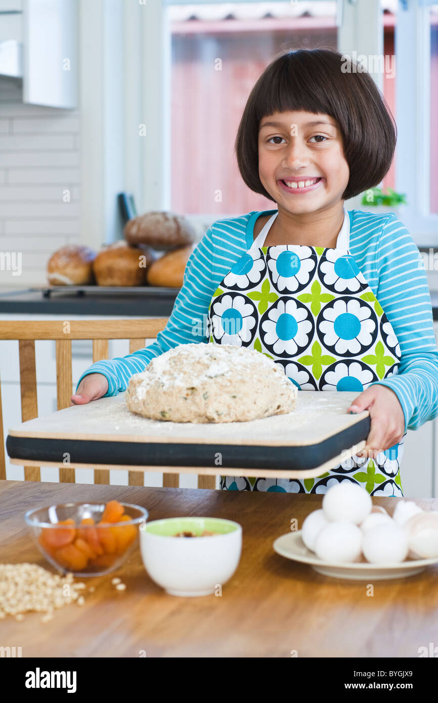 Portrait of girl baking in kitchen Stock Photo - Alamy